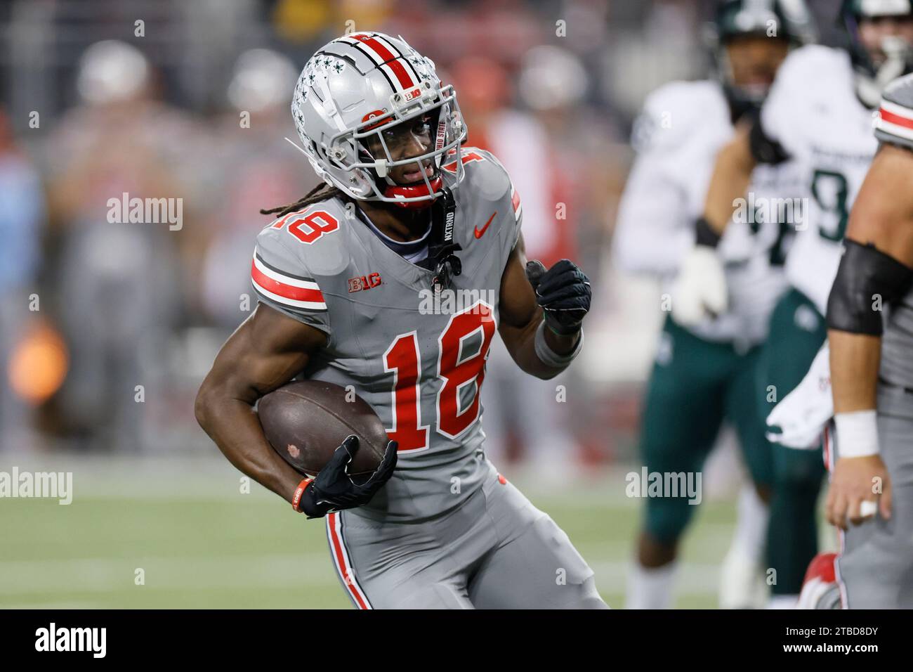 FILE - Ohio State receiver Marvin Harrison plays against Michigan State ...
