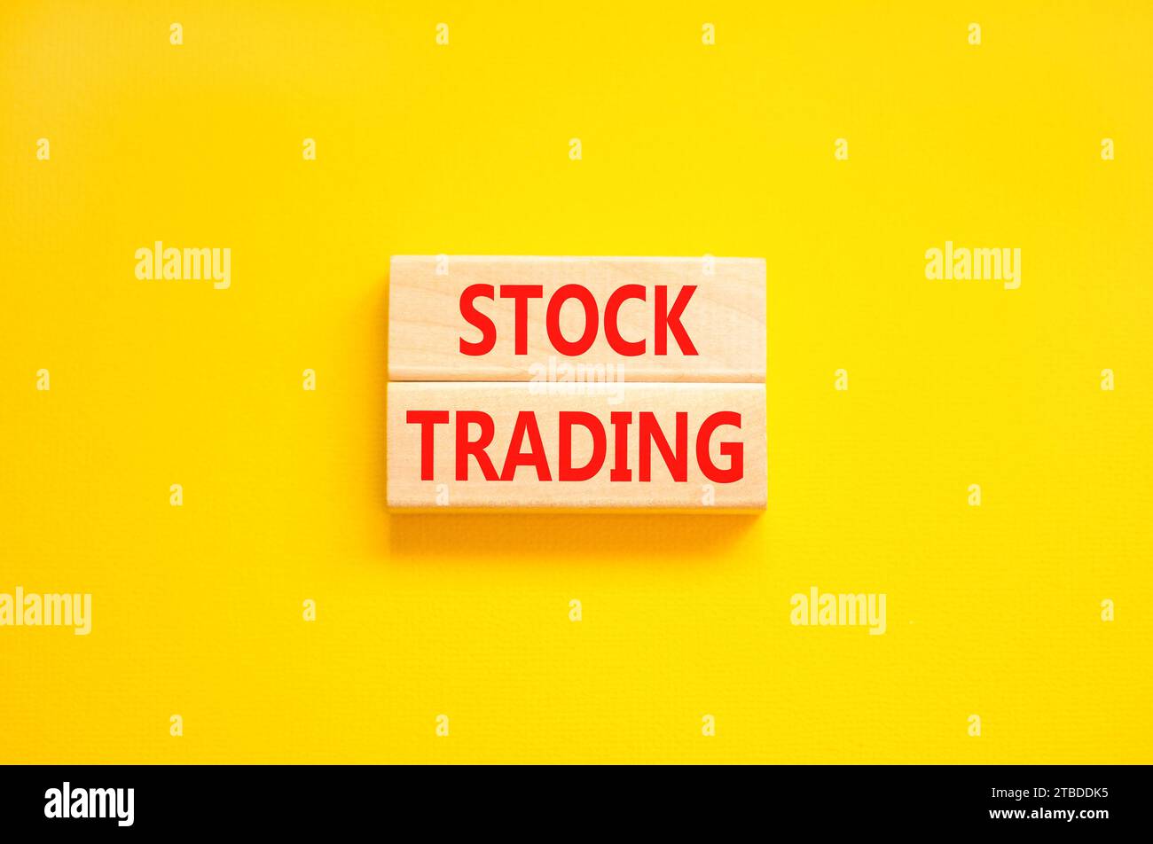 Stock trading symbol. Concept words Stock trading on beautiful wooden ...