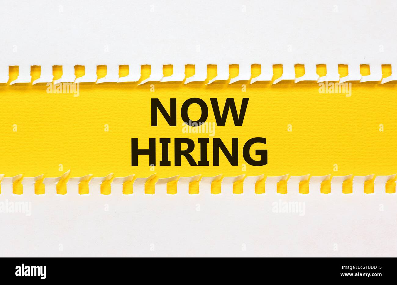 Now hiring symbol. Concept words Now hiring on beautiful yellow paper ...