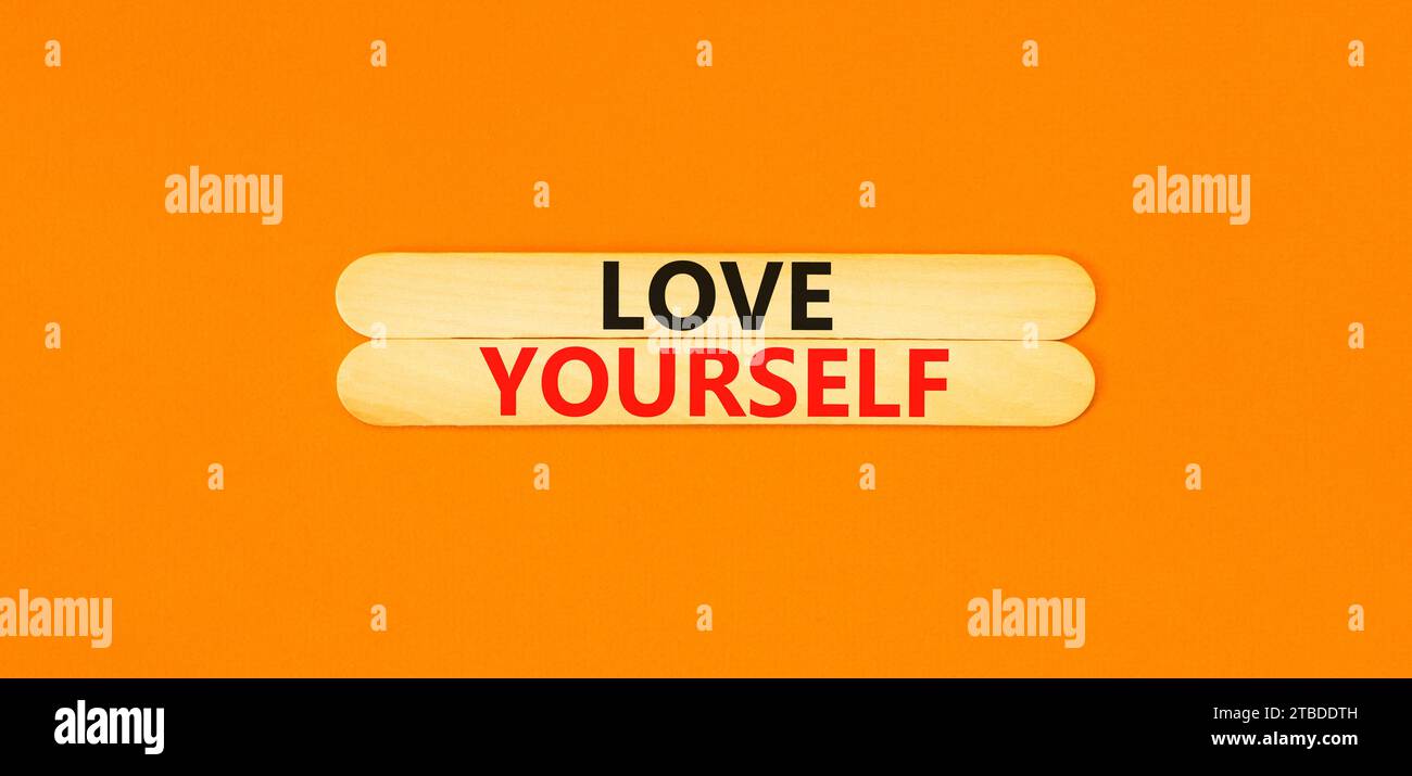 Love yourself symbol. Concept words Love yourself on beautiful wooden ...
