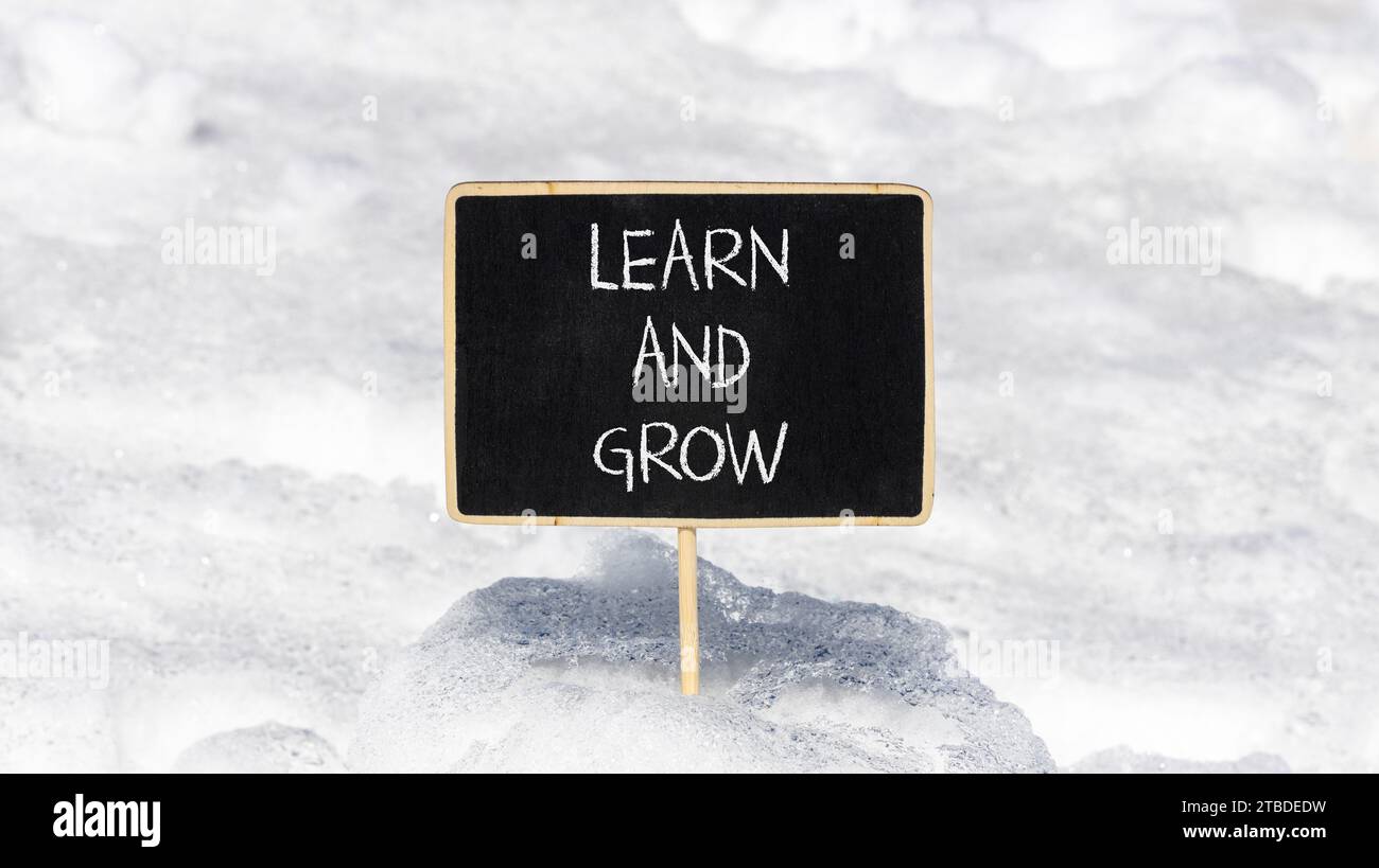 Learn and grow symbol. Concept word Learn And Grow on beautiful black ...
