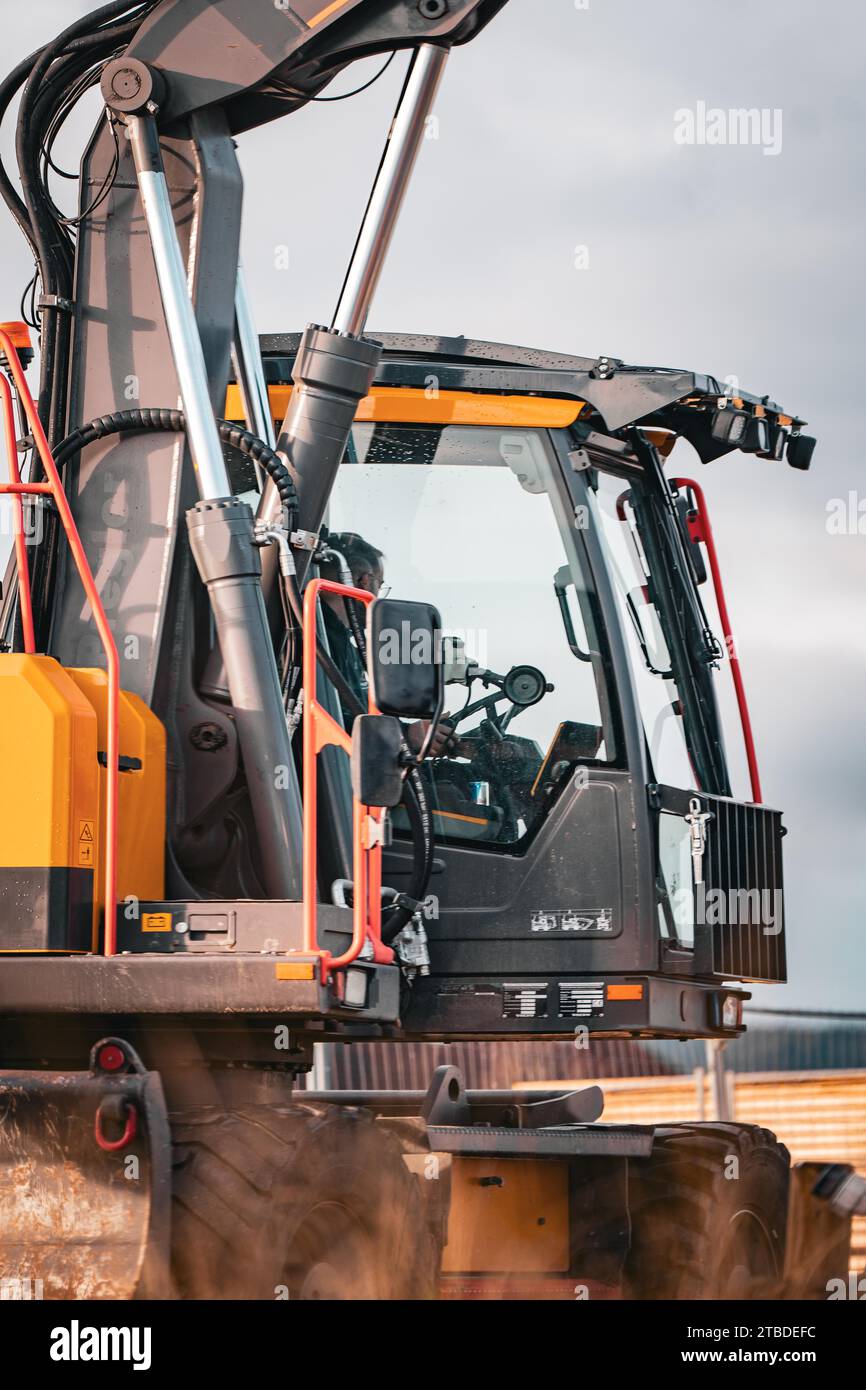 Yellow Volvo tracked excavator on construction site Stock Photo - Alamy