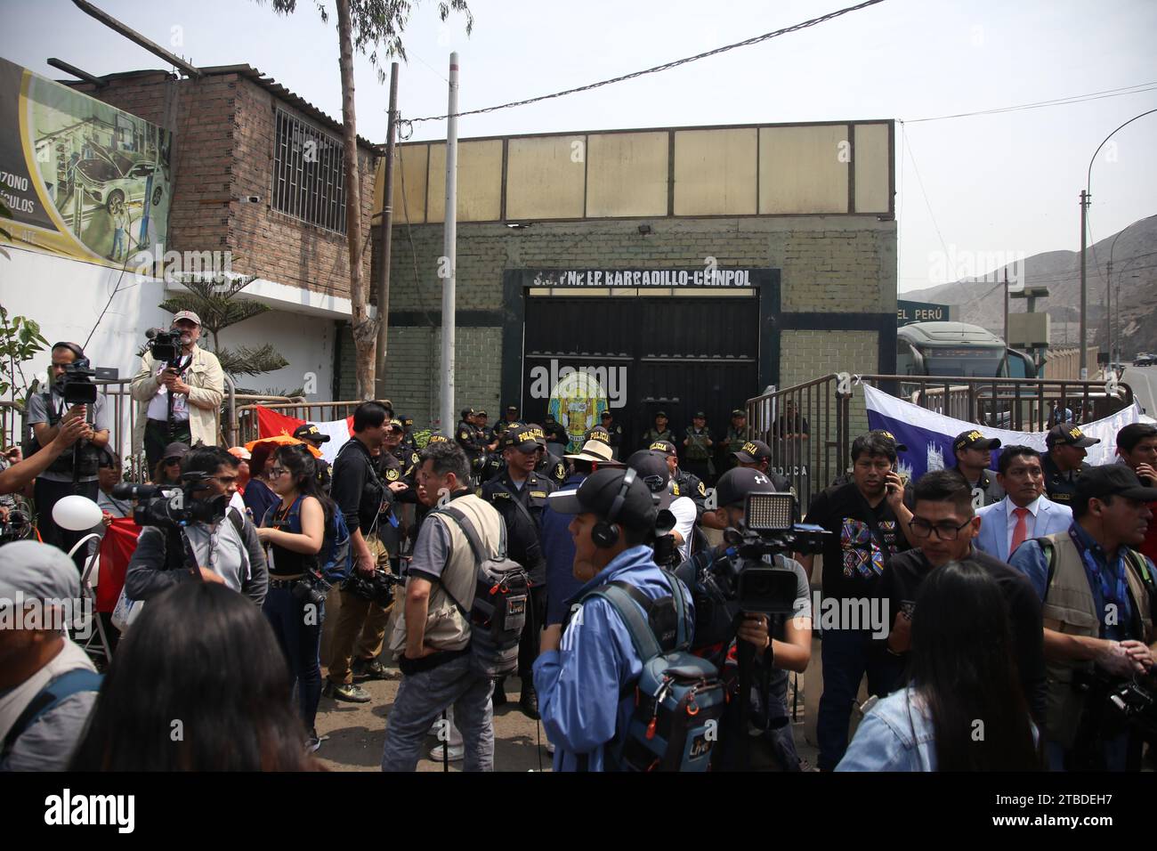 Lima, Peru. 06th Dec, 2023. Journalists and reporters wait outside the ...
