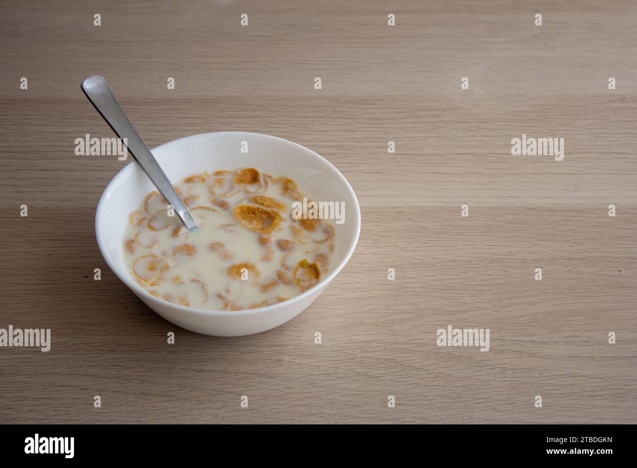 A morning breakfast of cereals with milk in a bowl Stock Photo - Alamy