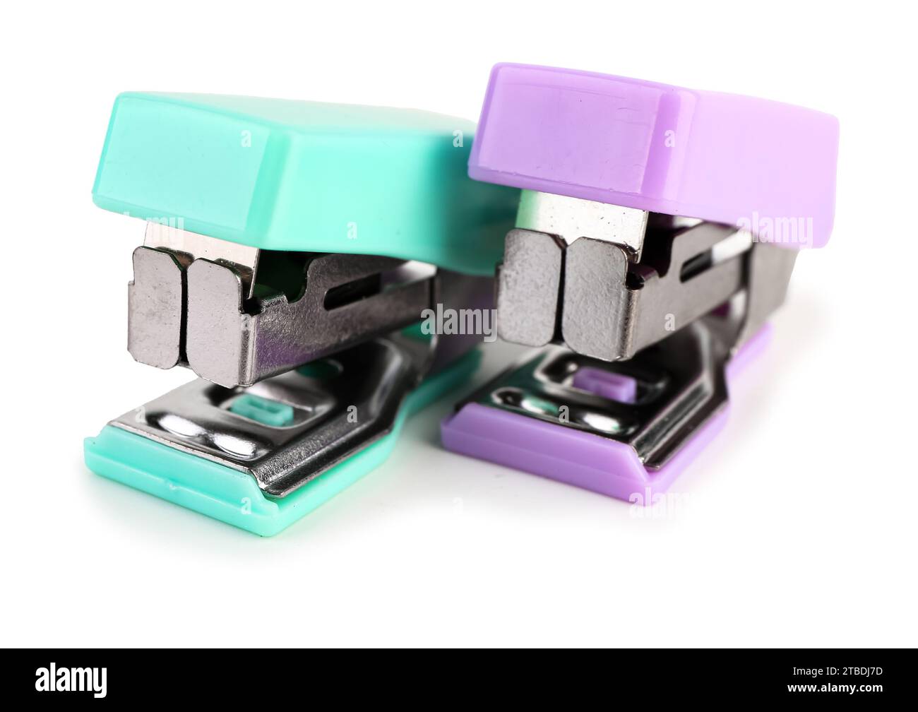 Colorful office isolated staplers on white background Stock Photo - Alamy