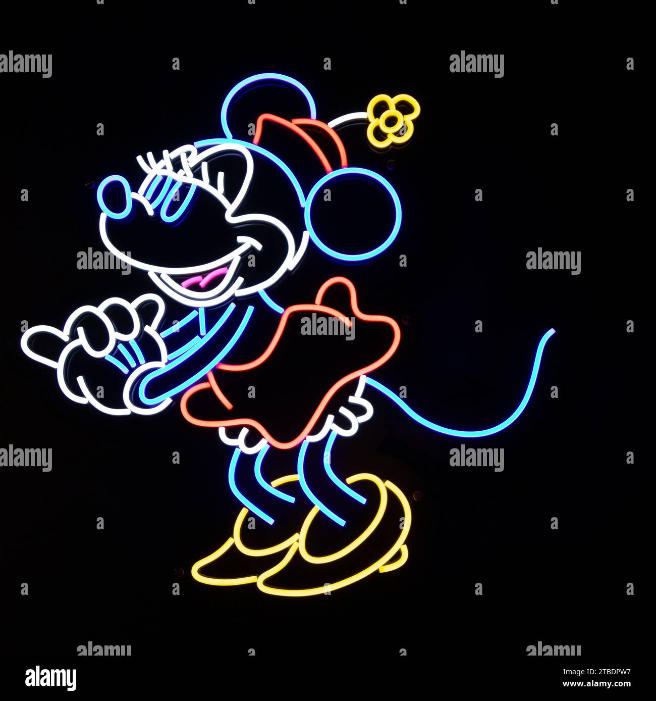 A neon sign of Mickey Mouse on a dark background Stock Photo - Alamy