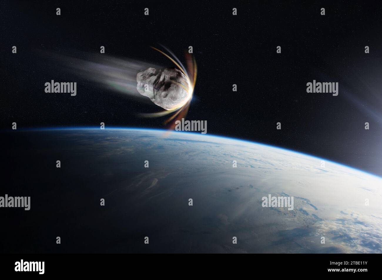 Earth planet and asteroid in outer space. Meteorite in outer space near ...