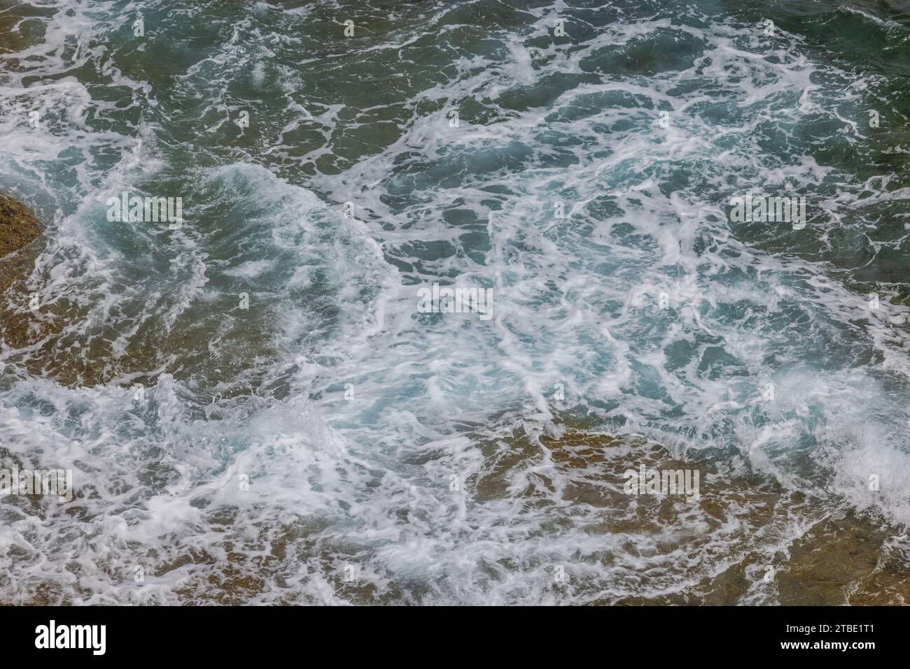 Background, texture showcasing appearance of frothy waters along ...