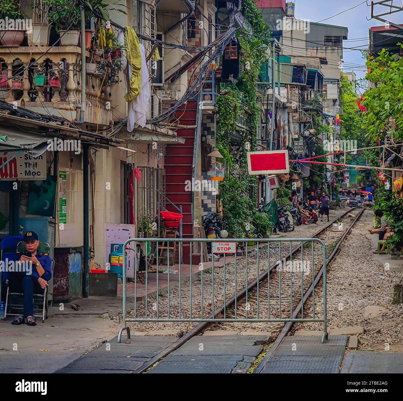 Hanoi, Vietnam - 04 30 2023: Hanoi train street in Vietnam and a police ...