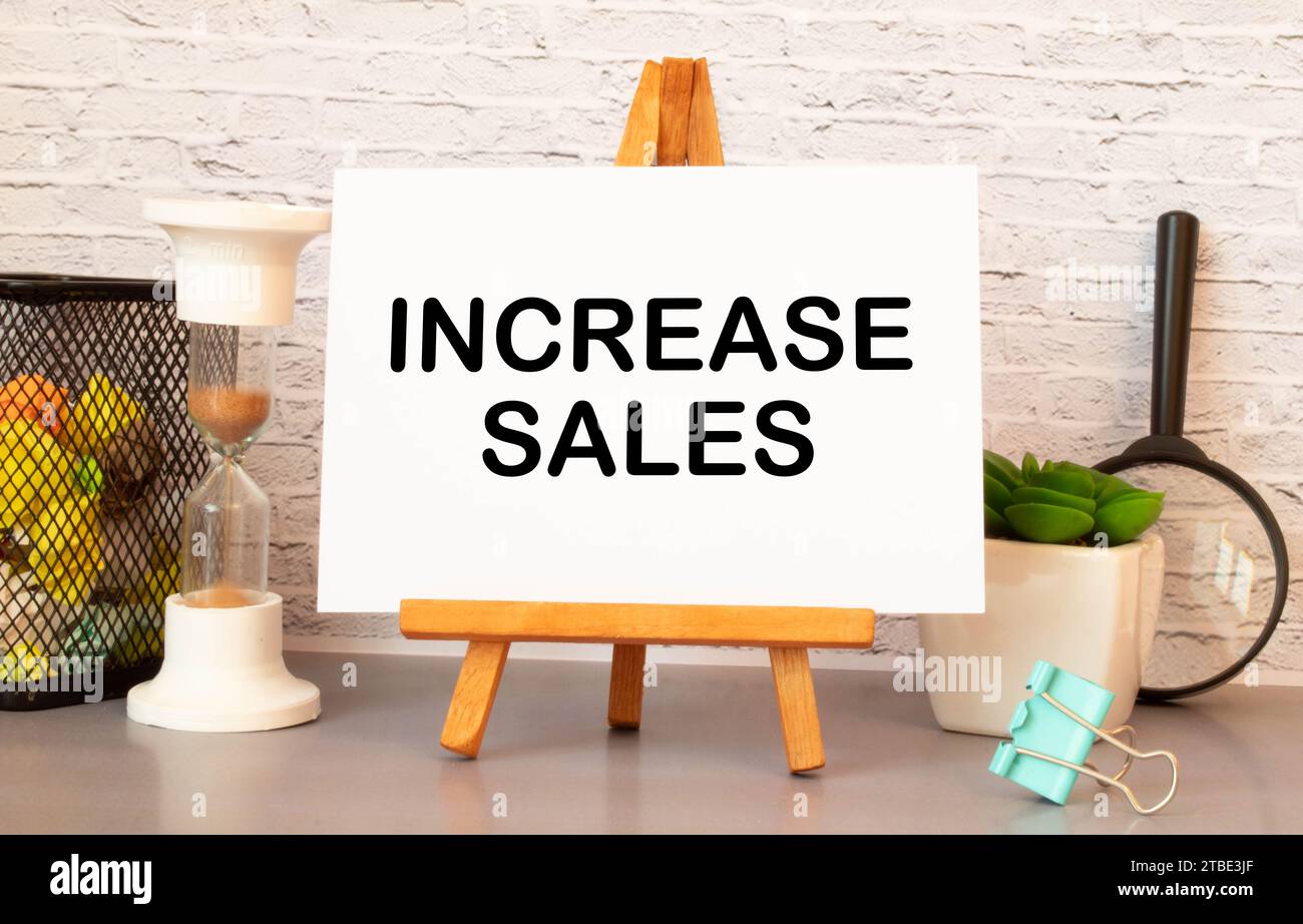 INCREASE SALES text on blackboard. Increase sale words, definition concept Stock Photo - Alamy