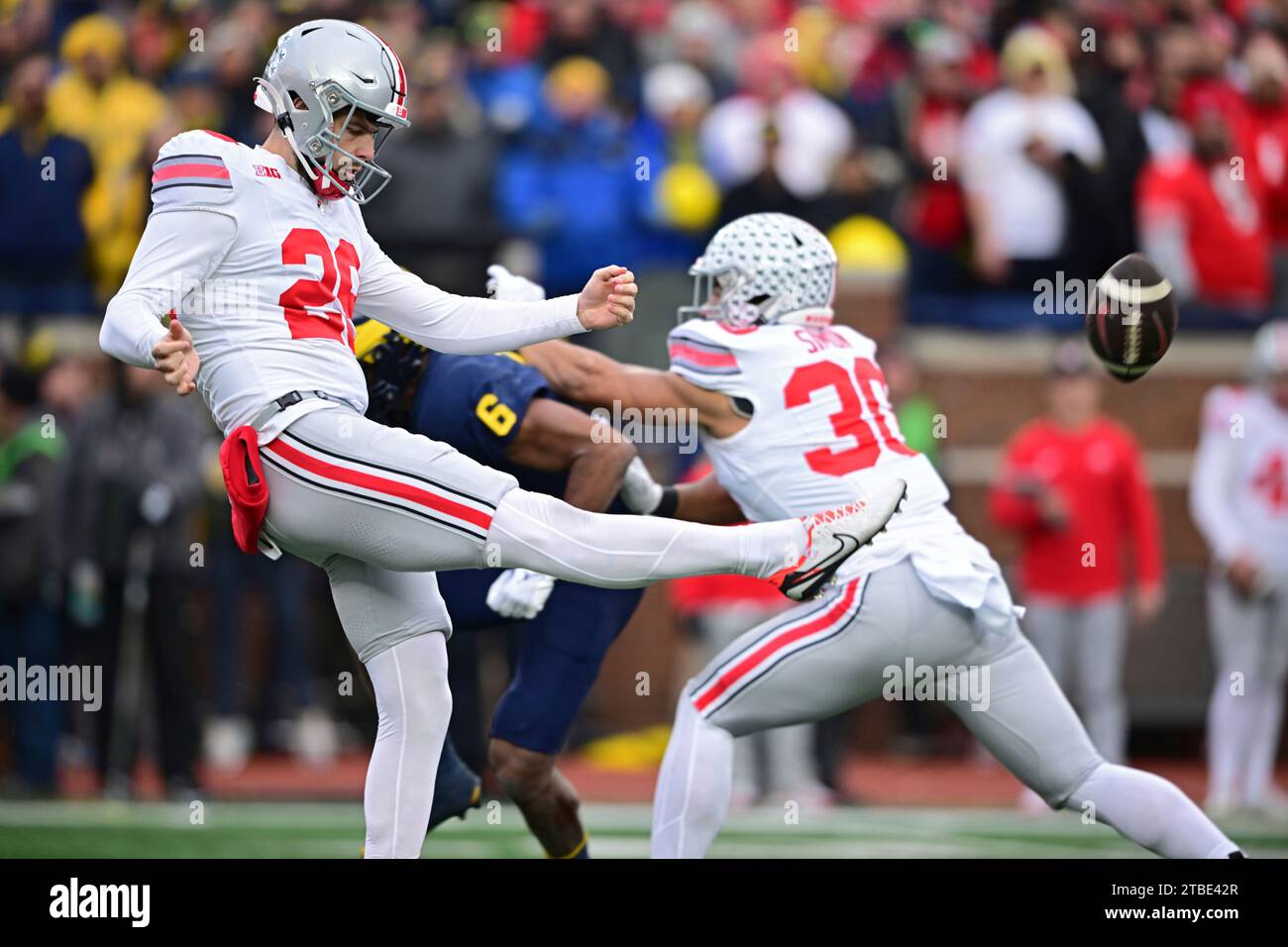 Ohio State punter Jesse Mirco punts during the second half of an NCAA ...