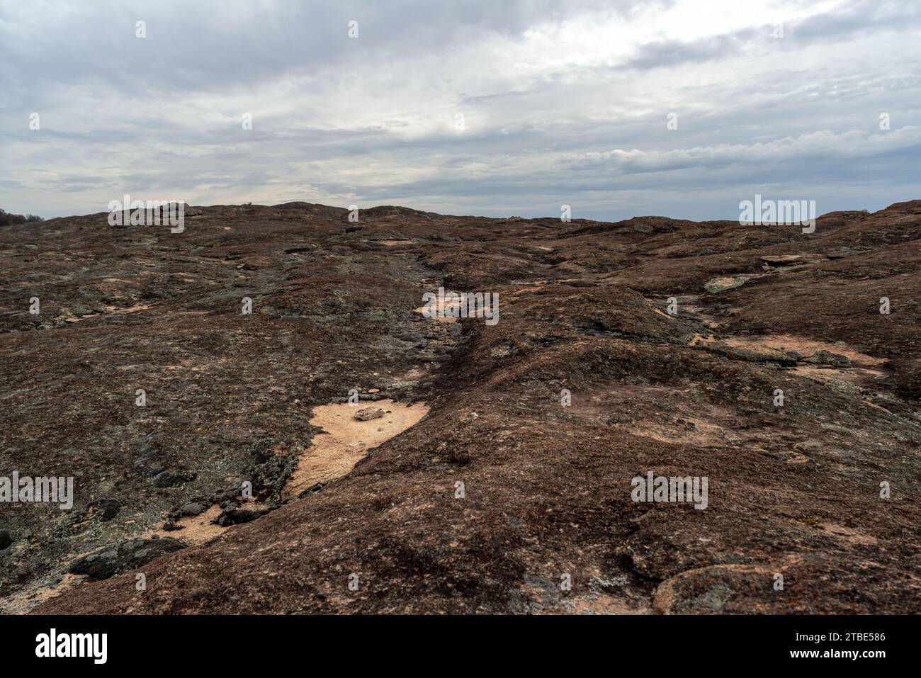 Automotive backplate or background featuring a rough rocky open space ...