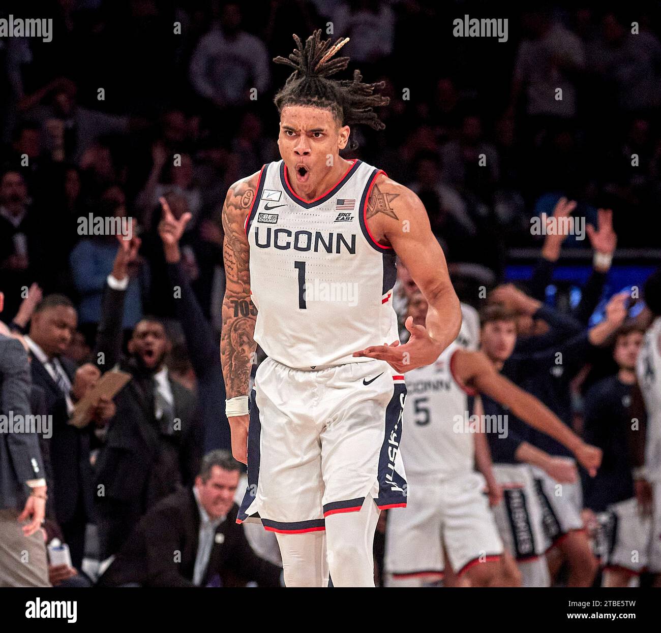 Connecticut Huskies guard Solomon Ball (1) reacts after a three pointer ...