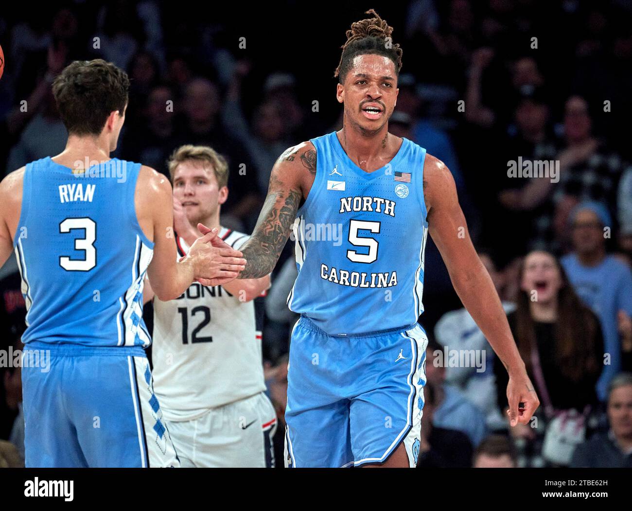 North Carolina Tar Heels forward Armando Bacot (5) and guard Cormac ...