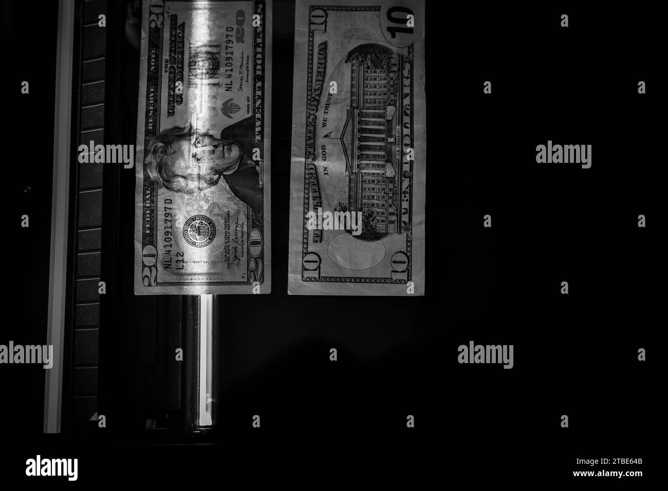 Using a copy machine to print forgery currency Stock Photo - Alamy