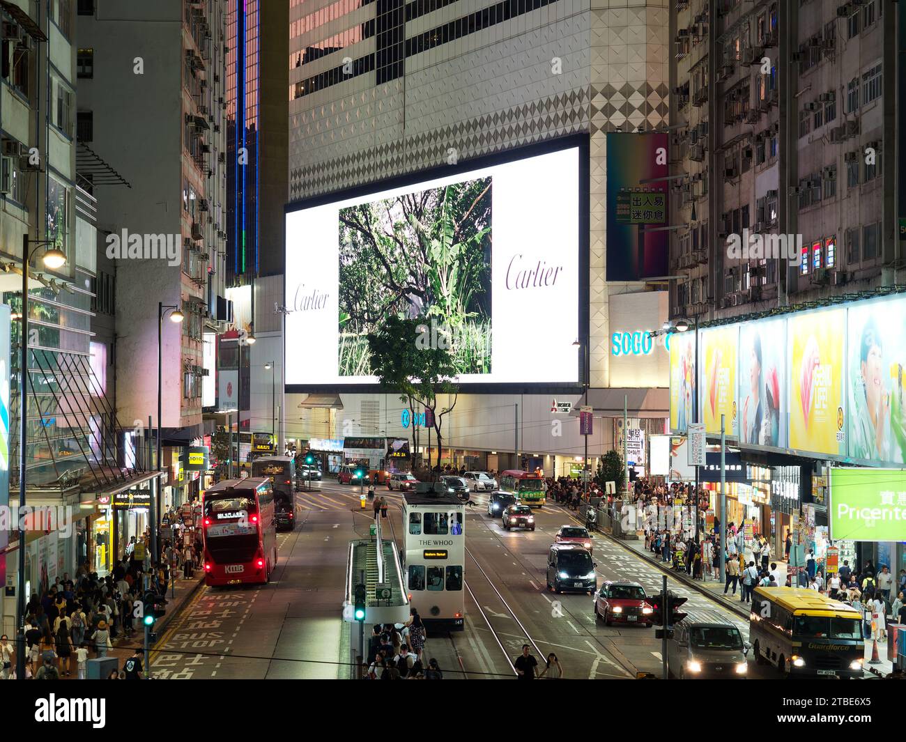 View looking down on Hong Kong traffic along Hennessy Road in Causeway Bay at night Stock Photo ...