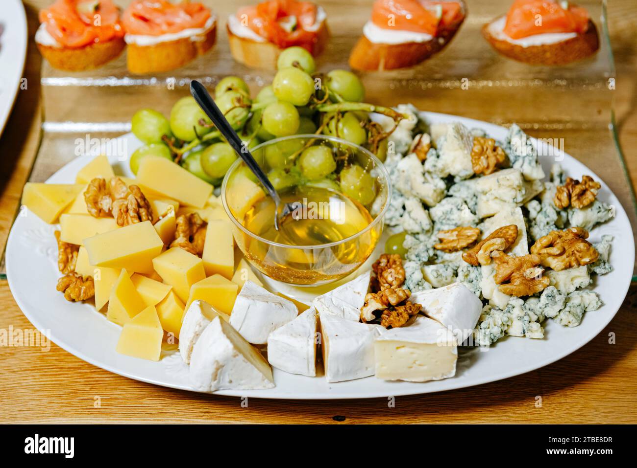 Elegant cheese selection featuring brie, blue cheese, and cheddar ...