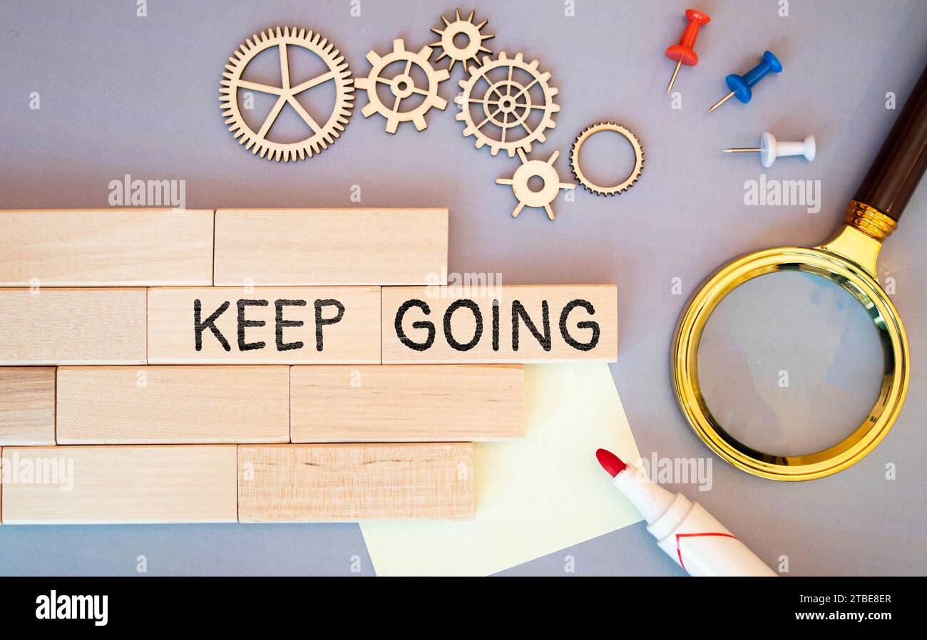 keep going - motivation or determination concept - handwriting on a ...