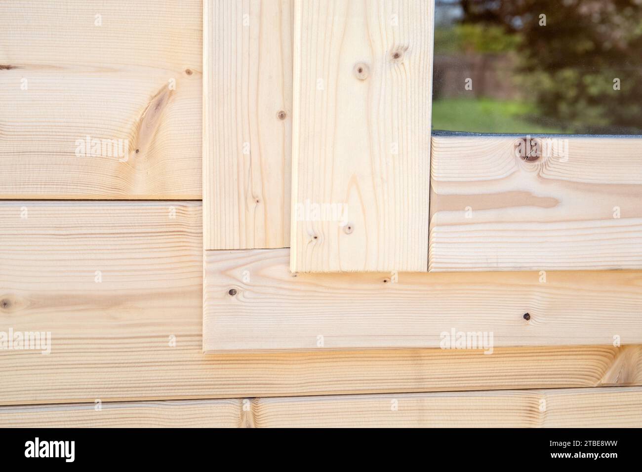Wooden shed with window. Details and construction Stock Photo - Alamy