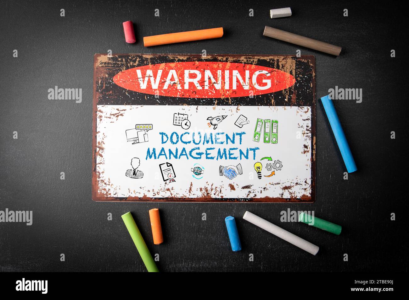 Document Management concept. Metal warning sign and colored pieces of ...