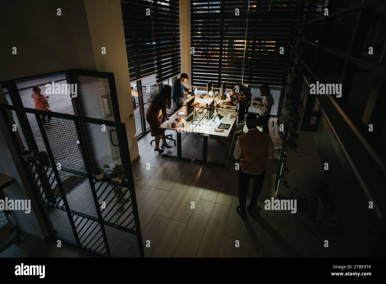 Top View Of Business People Collaborating And Analyzing Statistics For Profit Growth And Project