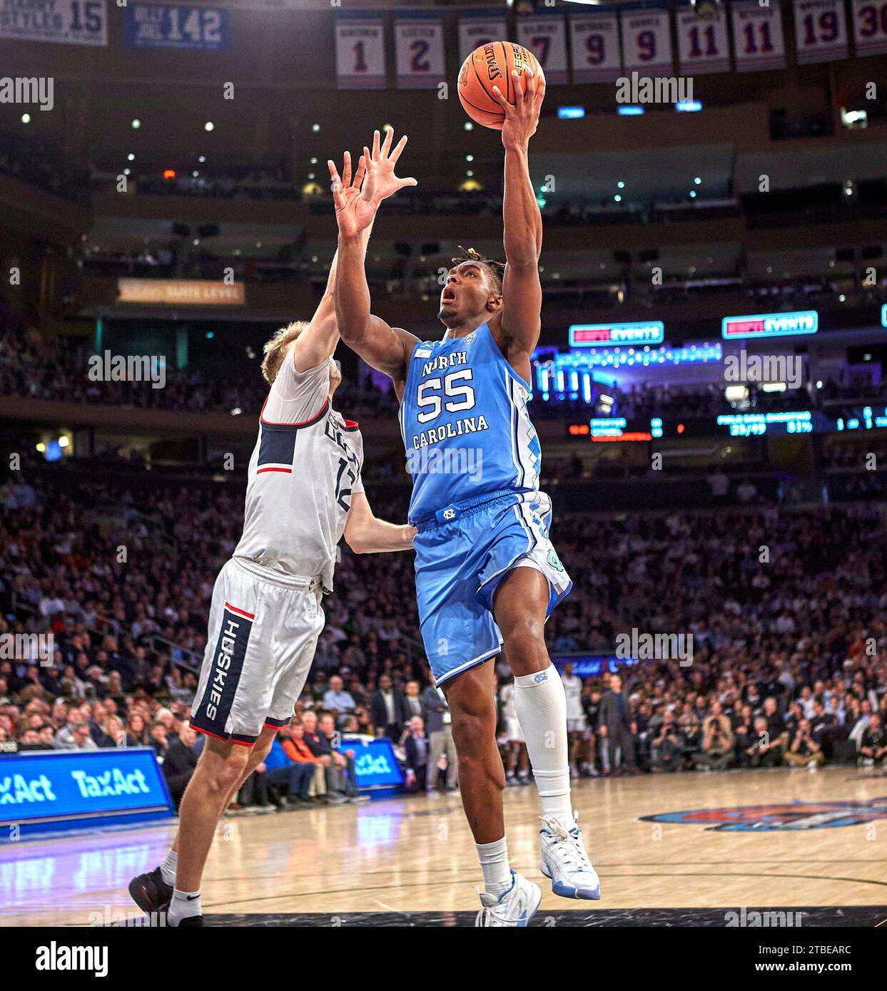 North Carolina Tar Heels forward Harrison Ingram (55) is defended by ...
