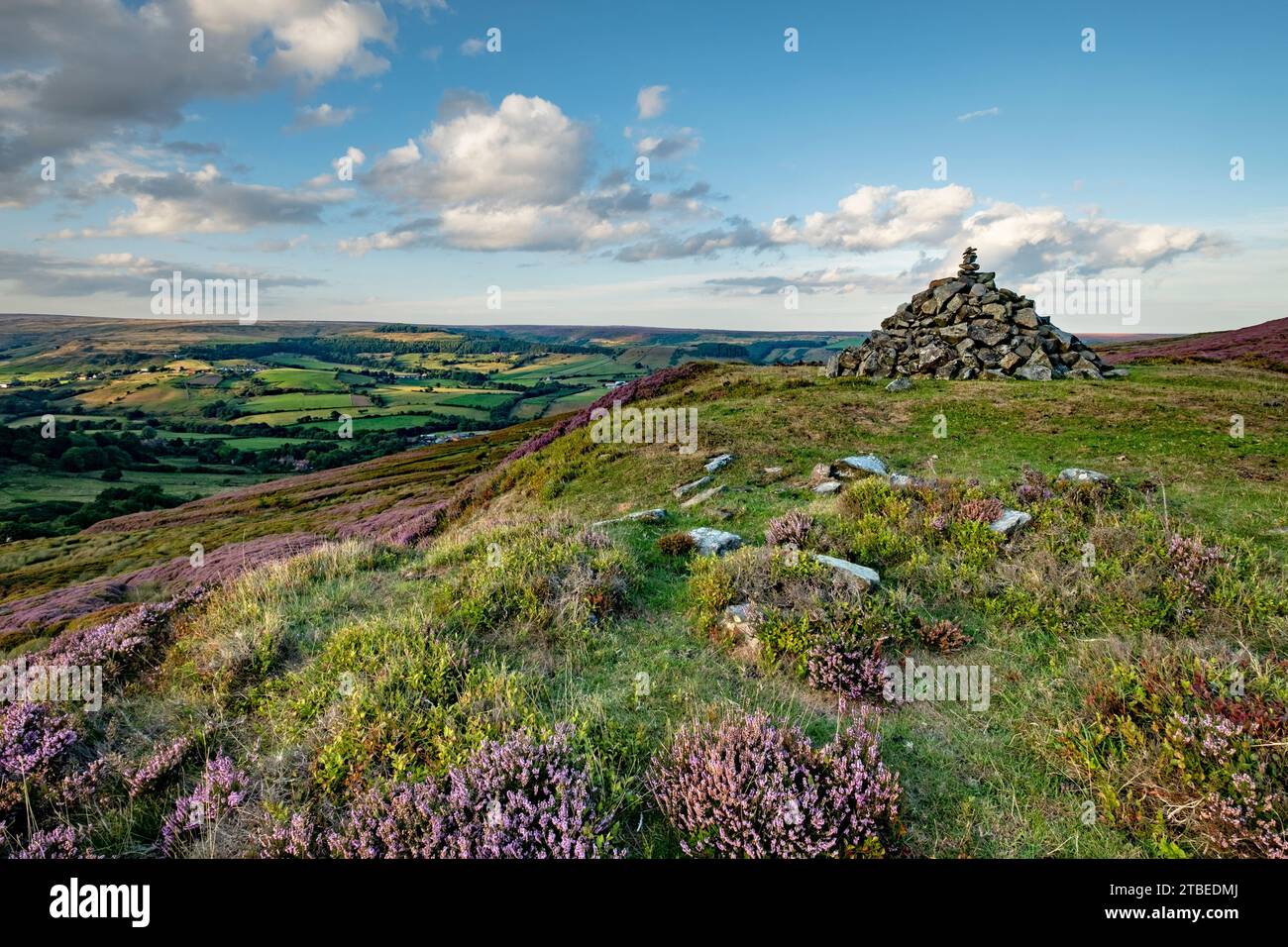 A cairn looking over Rosedale Abbey, North York Moors, North Yorkshire ...