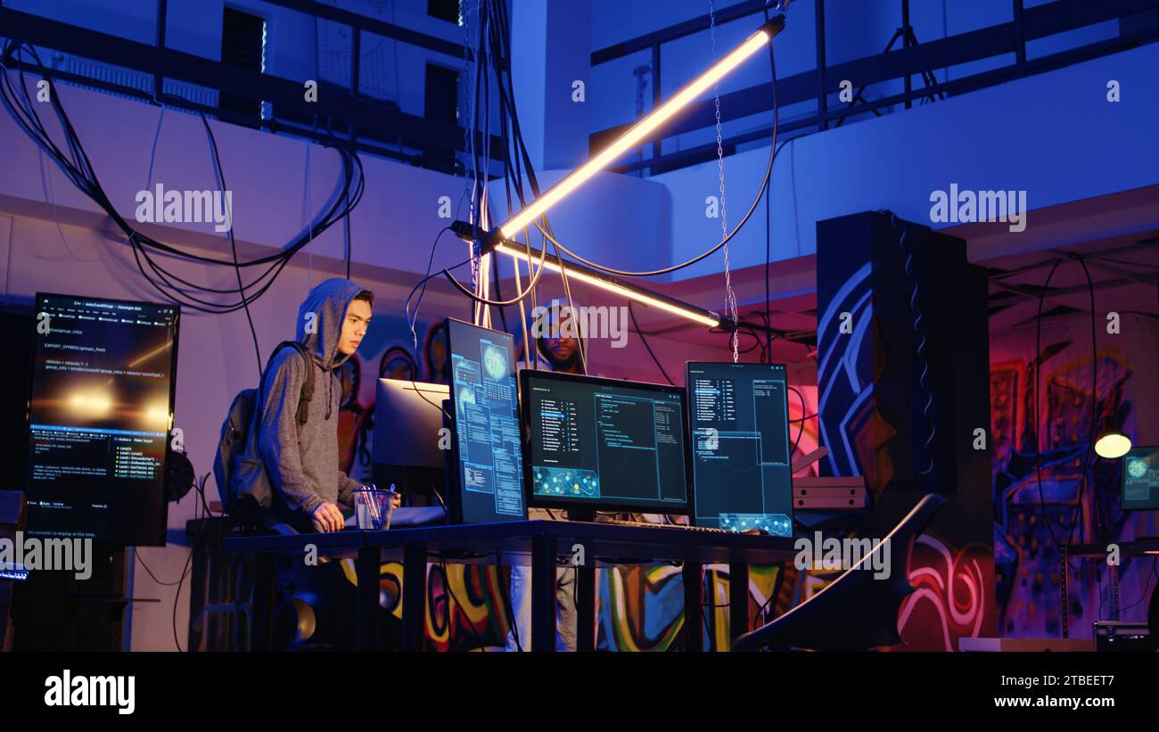 Hooded Criminal Welcoming New Member In Hacking Group Showing Him Around Secret Underground