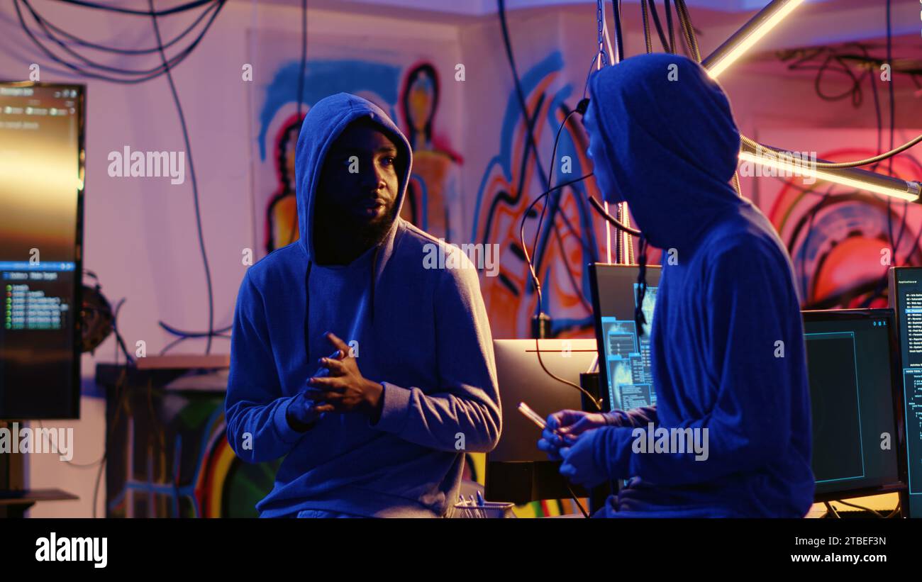 Hackers discussing insights about building spyware software designed to ...