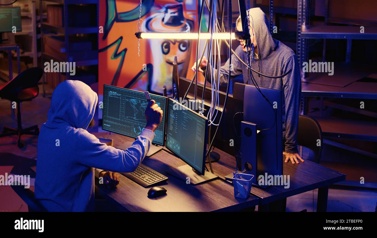 African american spy managing to steal military secrets on SSD, showing ...