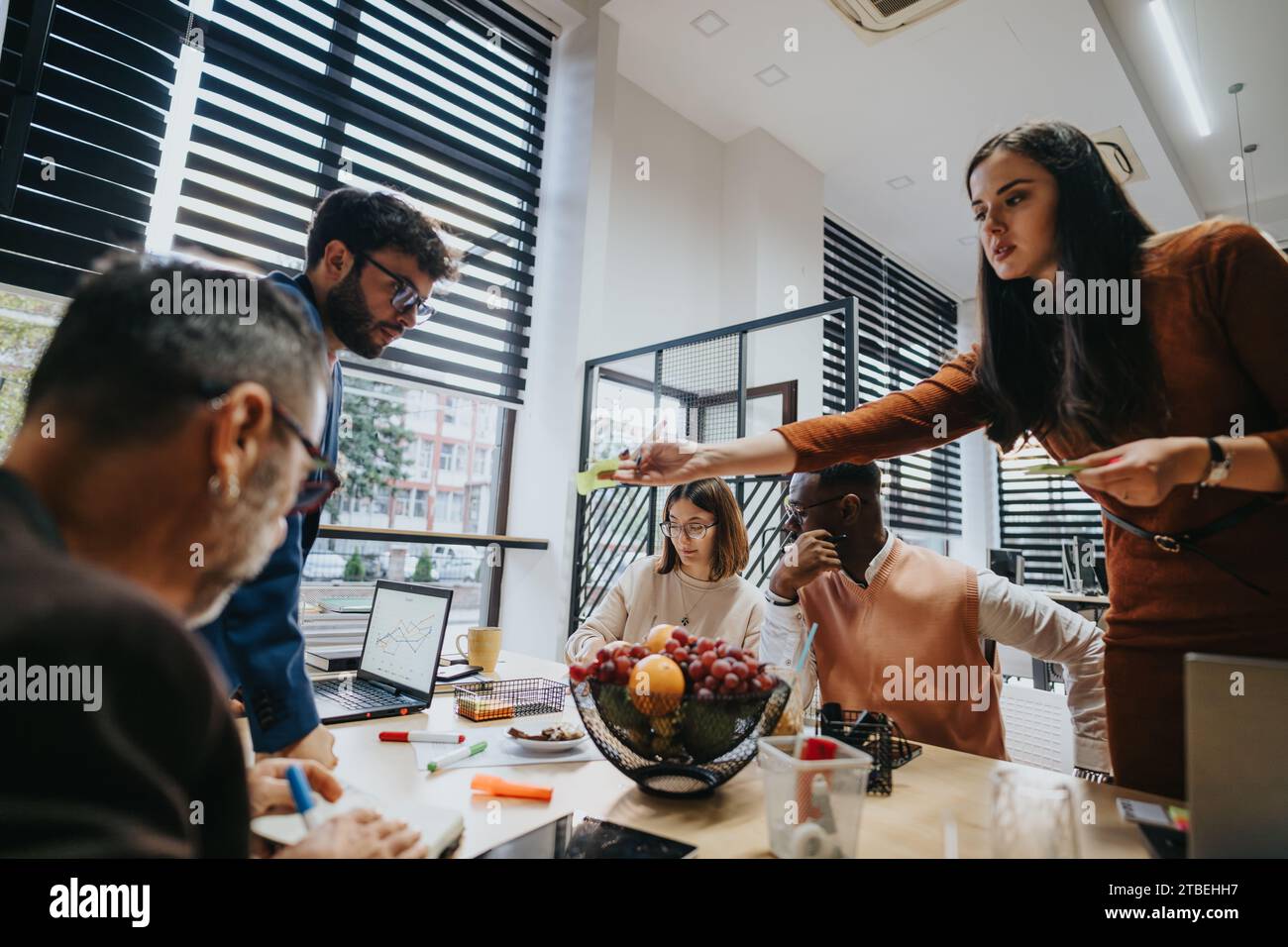 Businesspeople Discussing Creative Office Solutions for Business ...