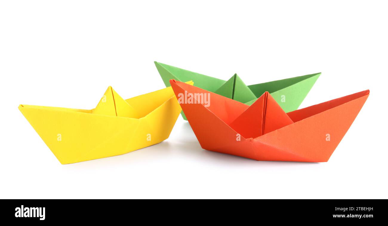 Yellow paper boat on Cut Out Stock Images & Pictures - Alamy