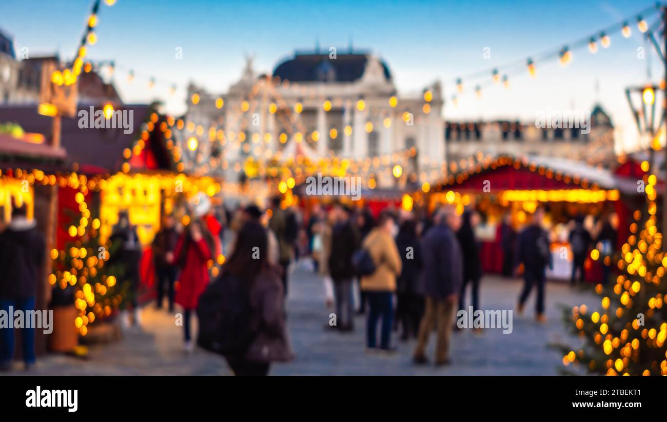 Intentionally blurred anamorphic photo of the Christmas market in front ...