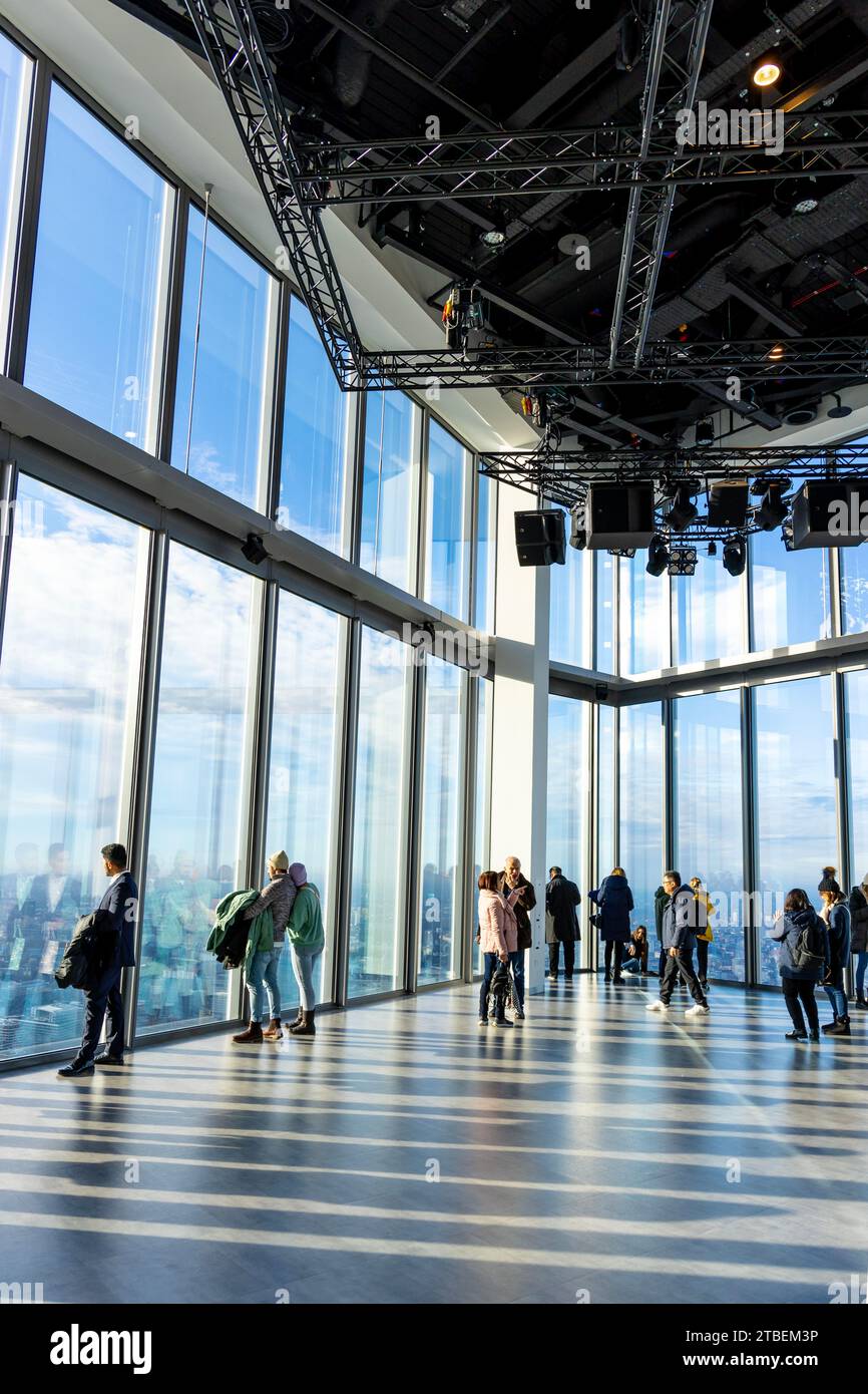 People looking at the city skyline from Horizon 22 viewing platform in ...