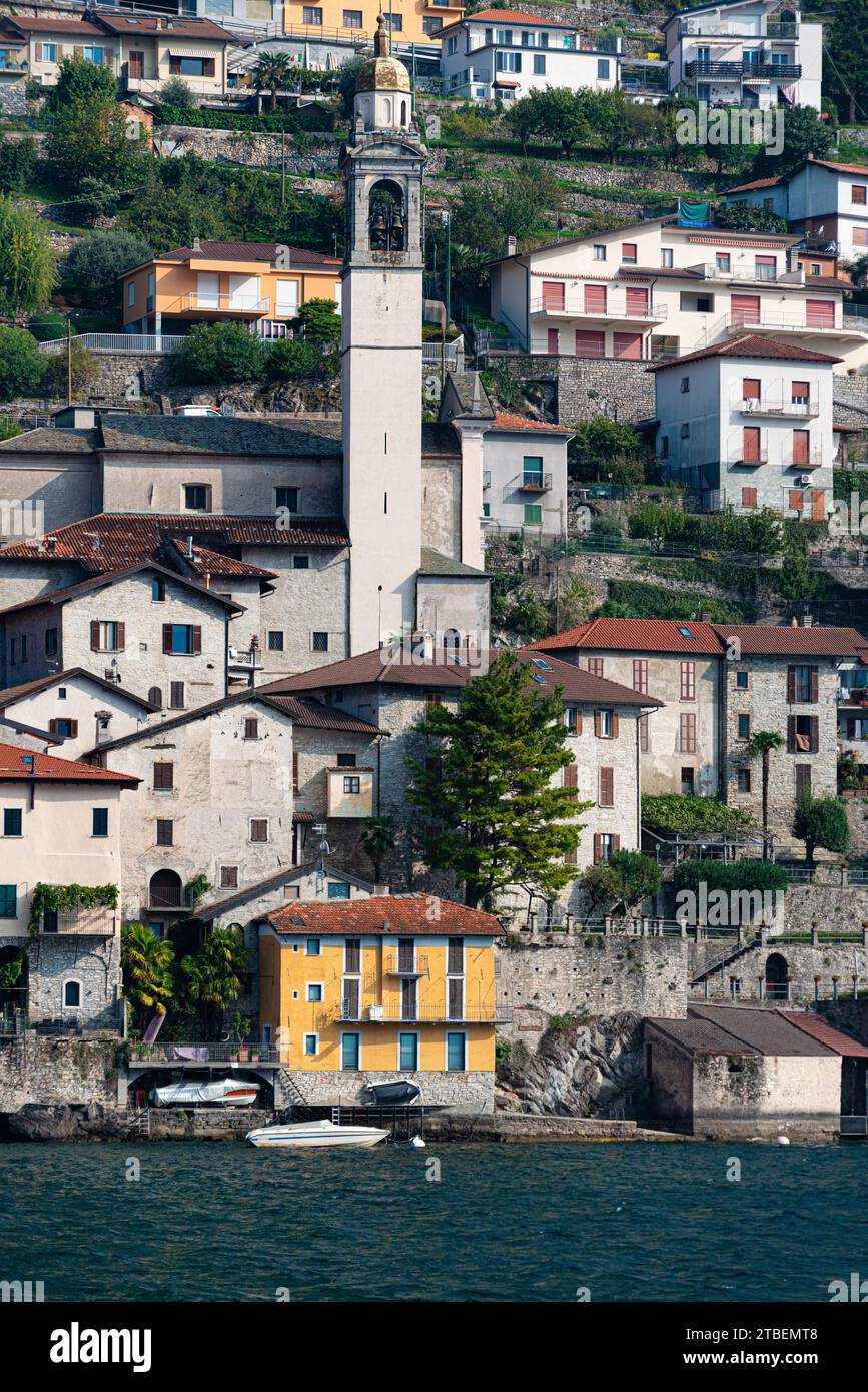 Blevio, Italy photographed from out in Lake Como featuring church tower Stock Photo - Alamy