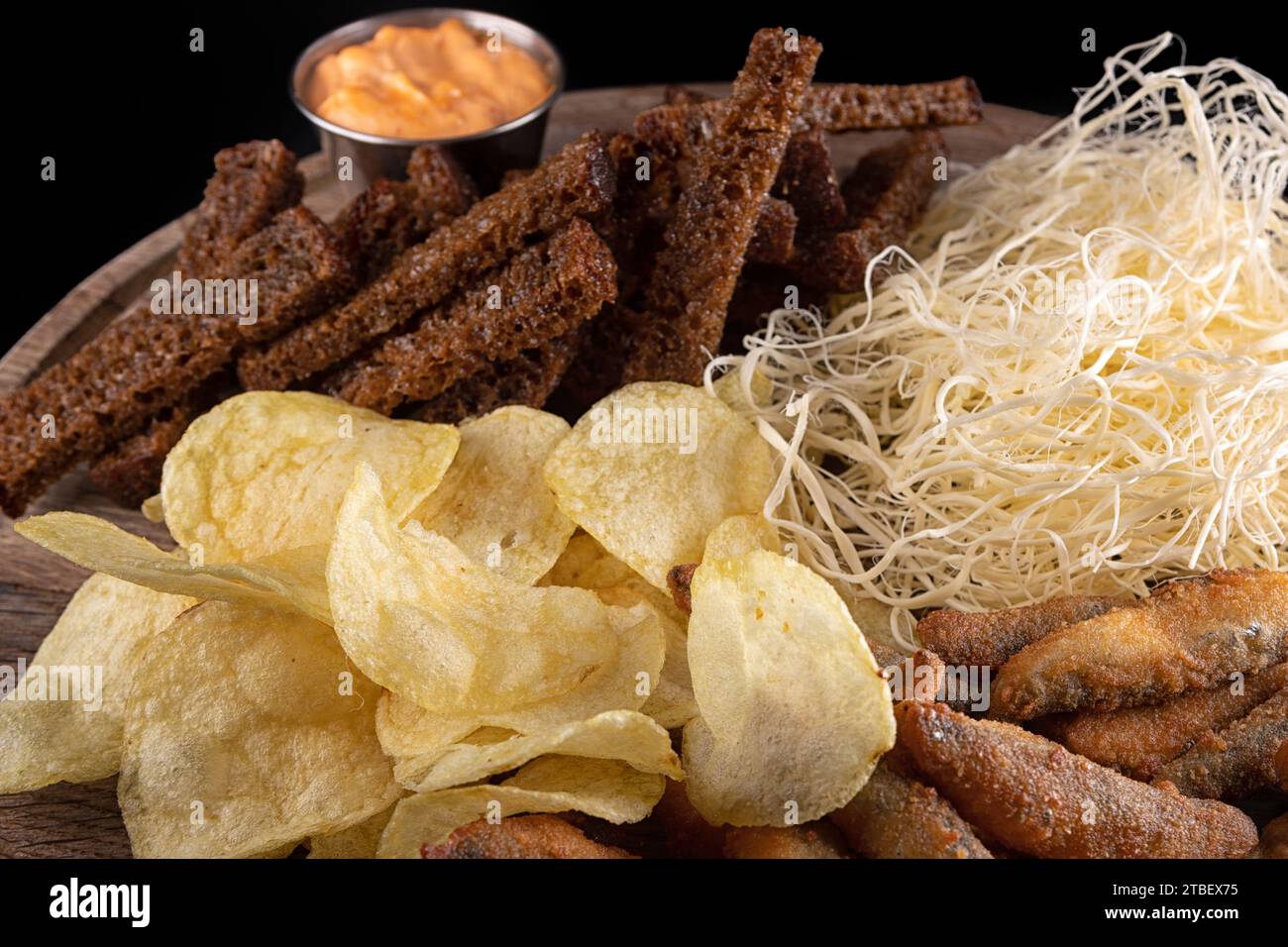 Snack chips crackers squid fried fish Stock Photo - Alamy