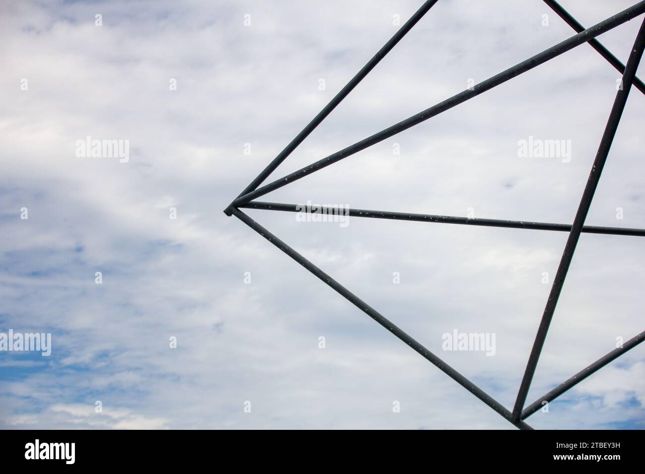 A random architecture (look like a star shape) with a blue sky ...