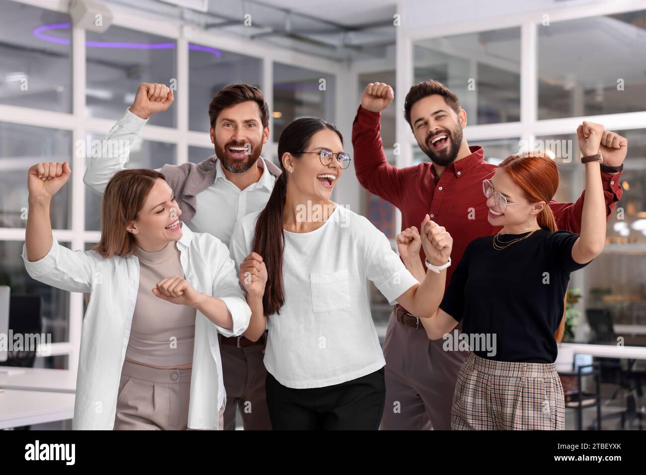 Portrait smiling colleagues celebrating hi-res stock photography and ...