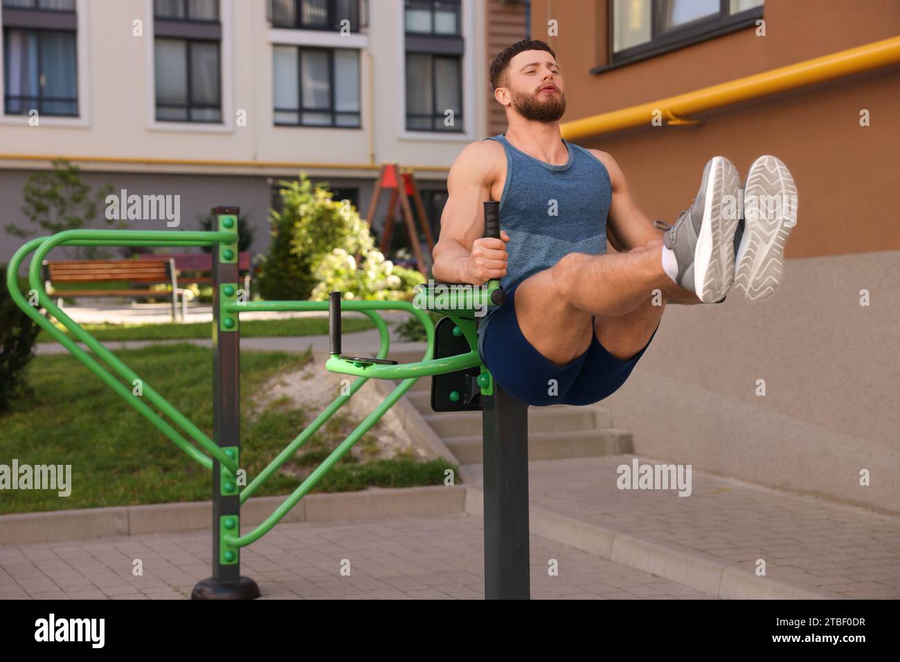 Gym machine leg lift hi-res stock photography and images - Alamy