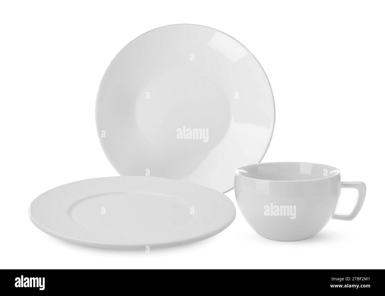 Clean plates and cup on white background Stock Photo - Alamy
