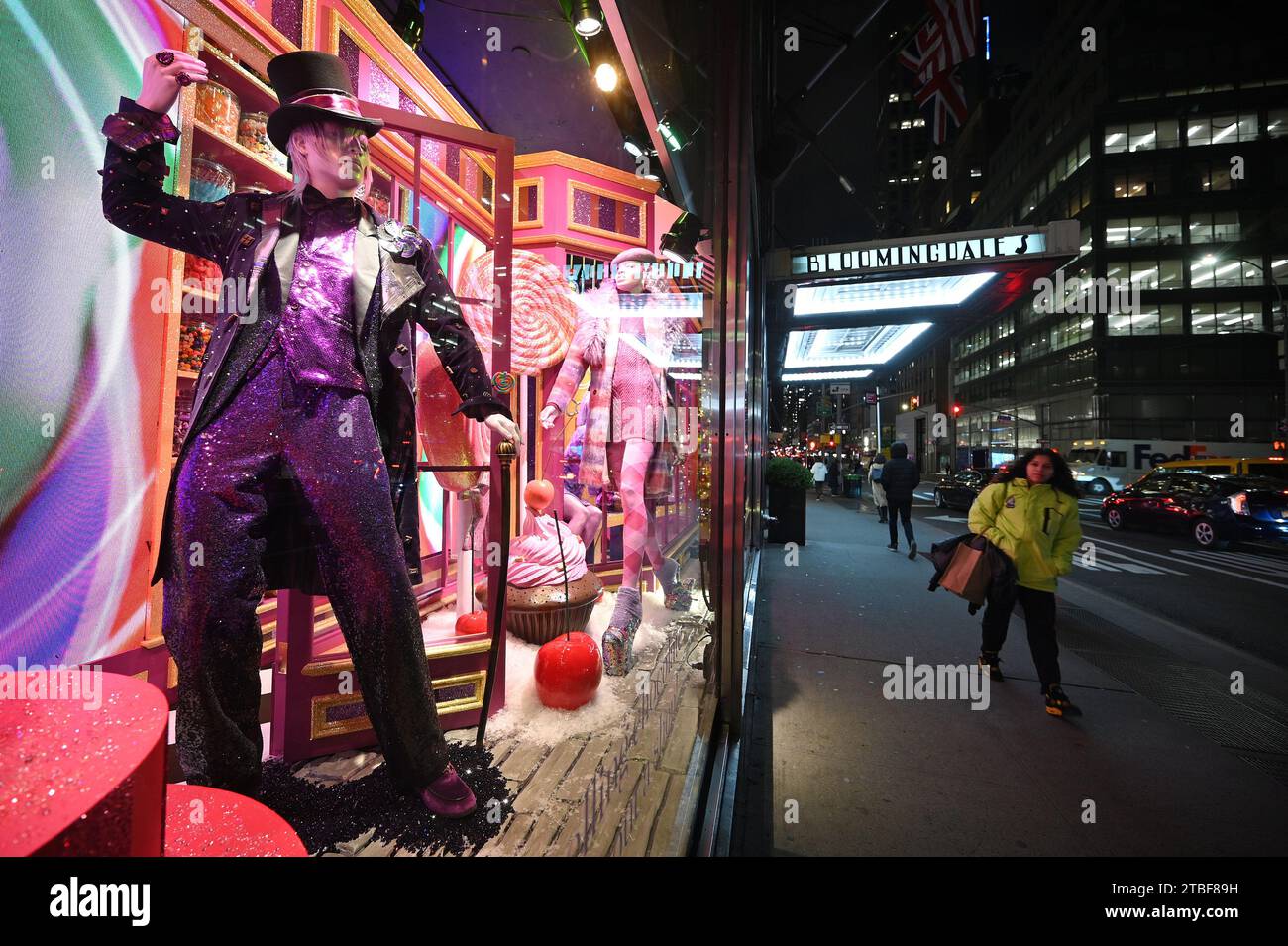 New York, USA. 06th Dec, 2023. A woman walks past the Willy Wonka ...