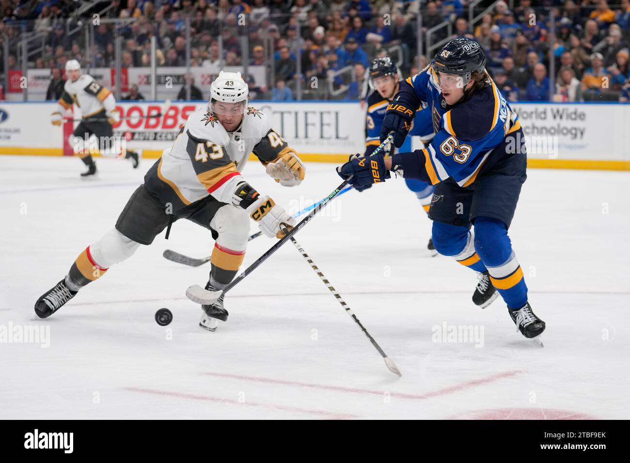 St. Louis Blues' Jake Neighbours (63) and Vegas Golden Knights' Paul ...