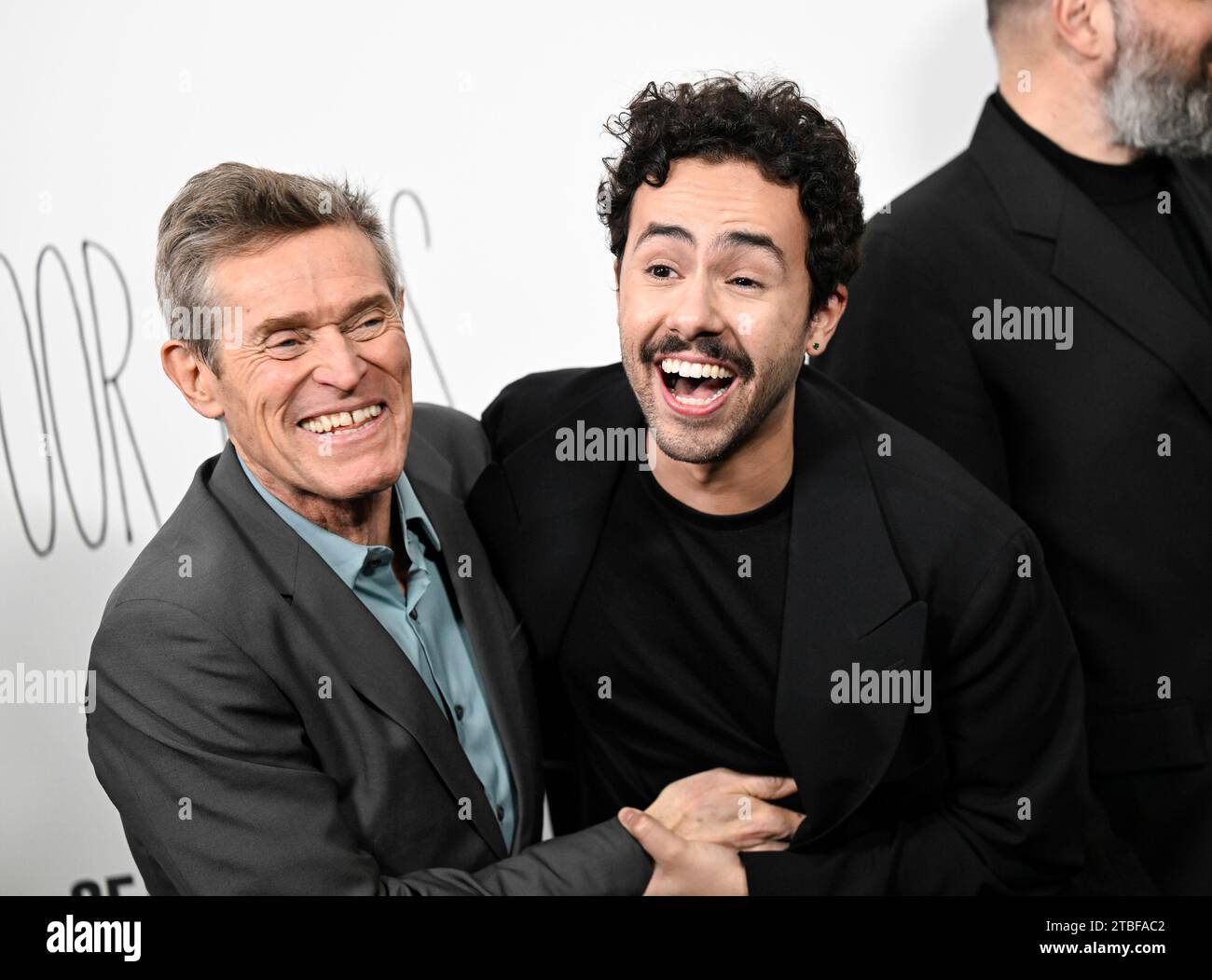 Willem Dafoe, left, and Ramy Youssef attend the premiere of "Poor Things" at the DGA New York ...
