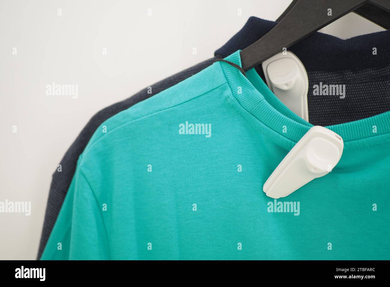 Security tags on clothes hi-res stock photography and images - Alamy