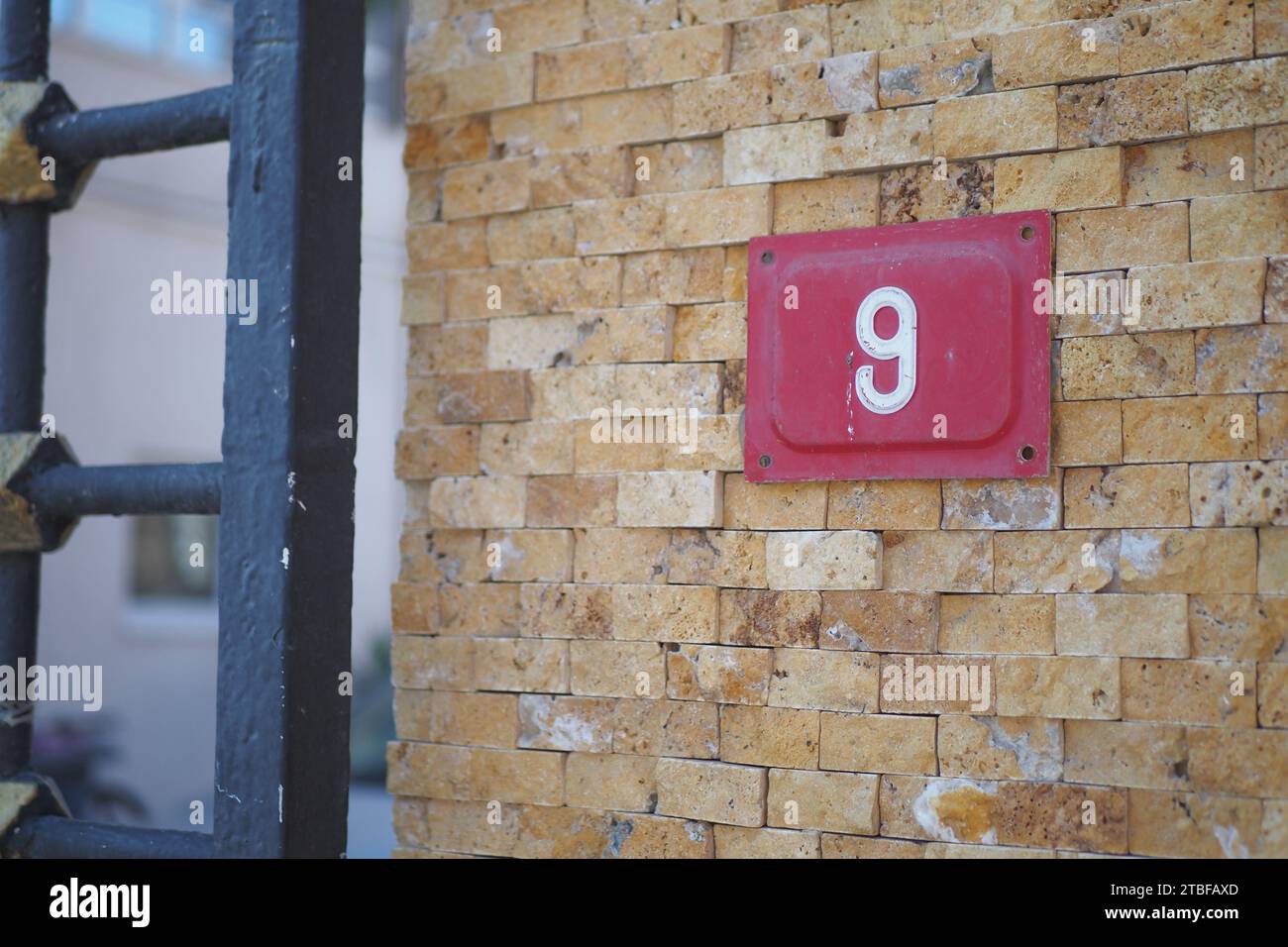 house number nice. Decorative lettering on a brick wall Stock Photo - Alamy