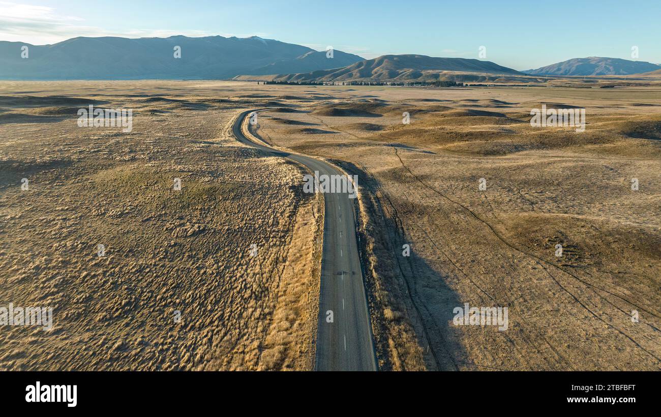 Drone perspective of the rural and remote country road through arid ...