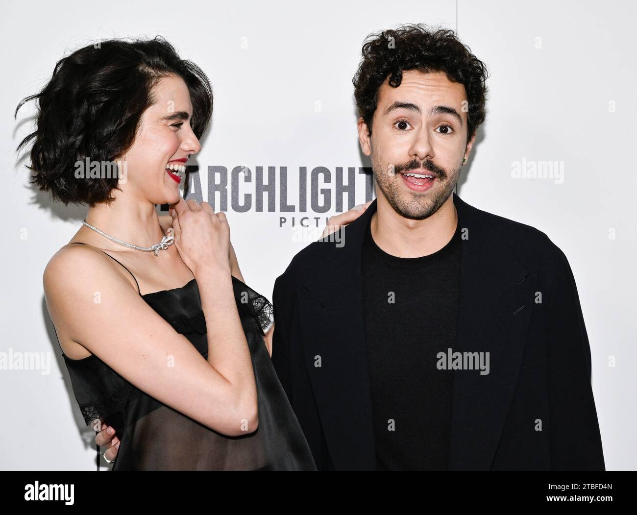 Margaret Qualley, left, and Ramy Youssef attend the premiere of "Poor ...