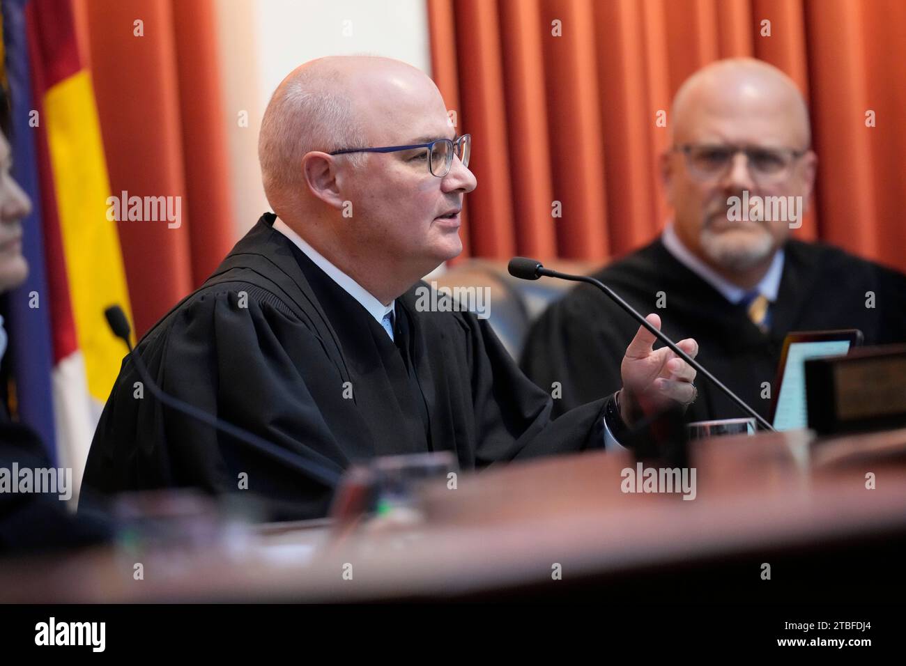 Colorado Supreme Court Chief Justice Brian D. Boatright, front, makes a ...