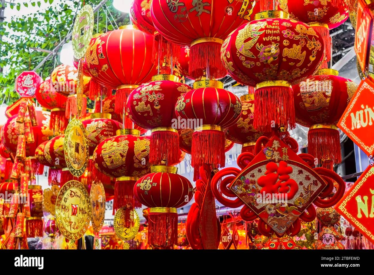 Many red lanterns with vietnamese language translated as "Happy New ...