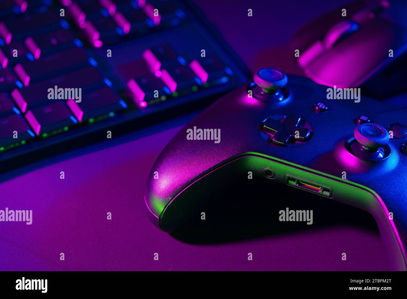 Computer keyboard, mouse and joystick on black background Stock Photo ...